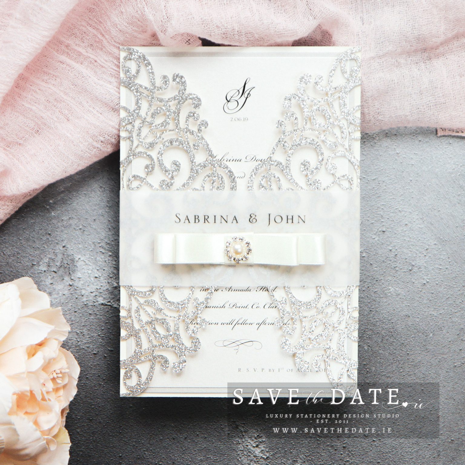 Elegant glitter laser cut silver invitation with wrap band, jewel and ...